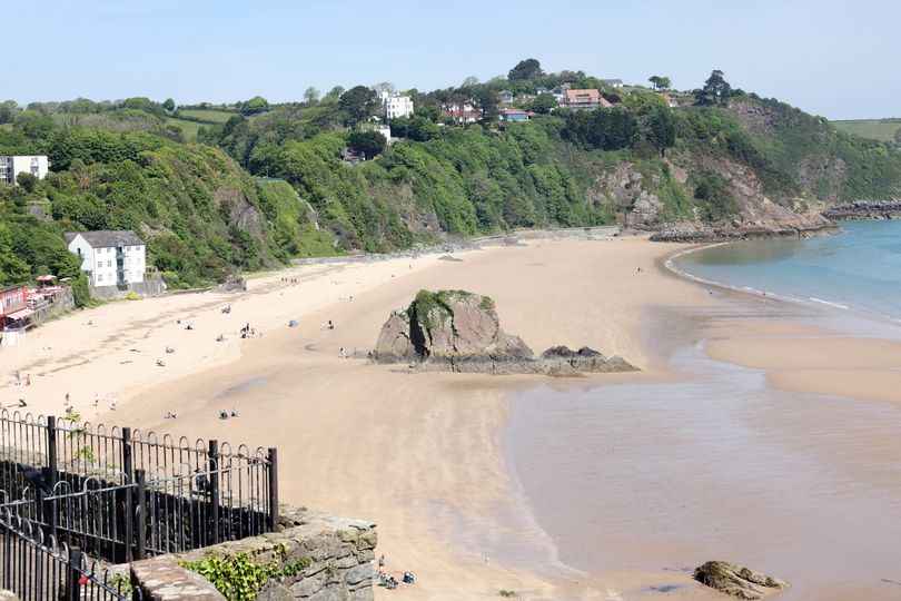 Welsh language signs daubed with black graffiti in seaside town