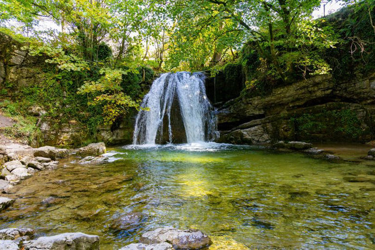 'Magical' fairy waterfall with glowing green pools just 50 miles from ...