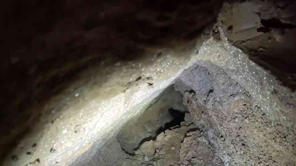 They dug into a sinkhole full of trash and uncovered crystals