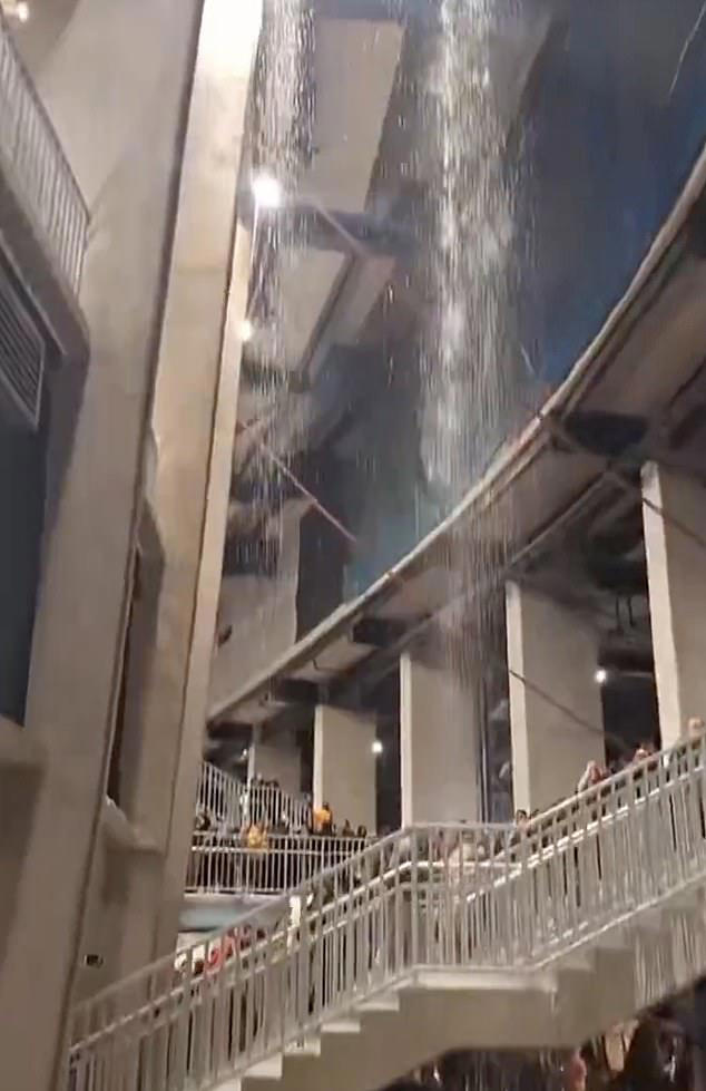 Barcelona's newly-renovated Nou Camp is flooded by heavy rain as ...