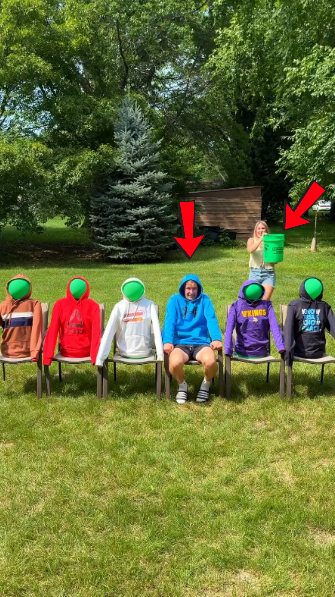 Water bucket roulette yard game with family