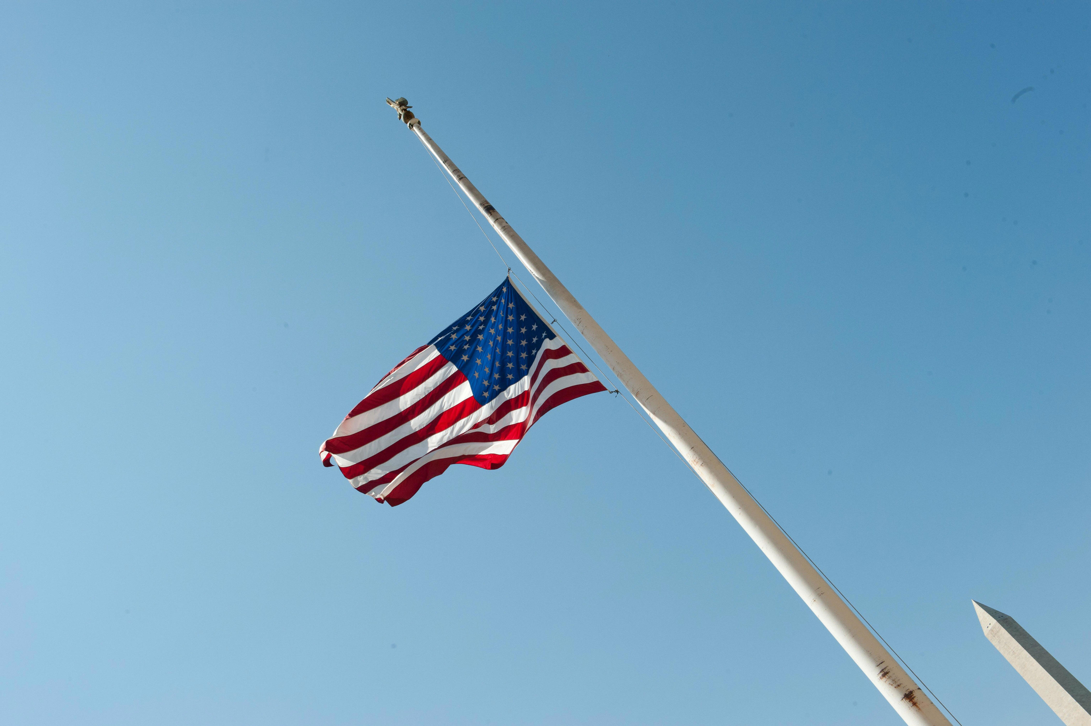 Why are San Diego County flags lowered to half staff today?