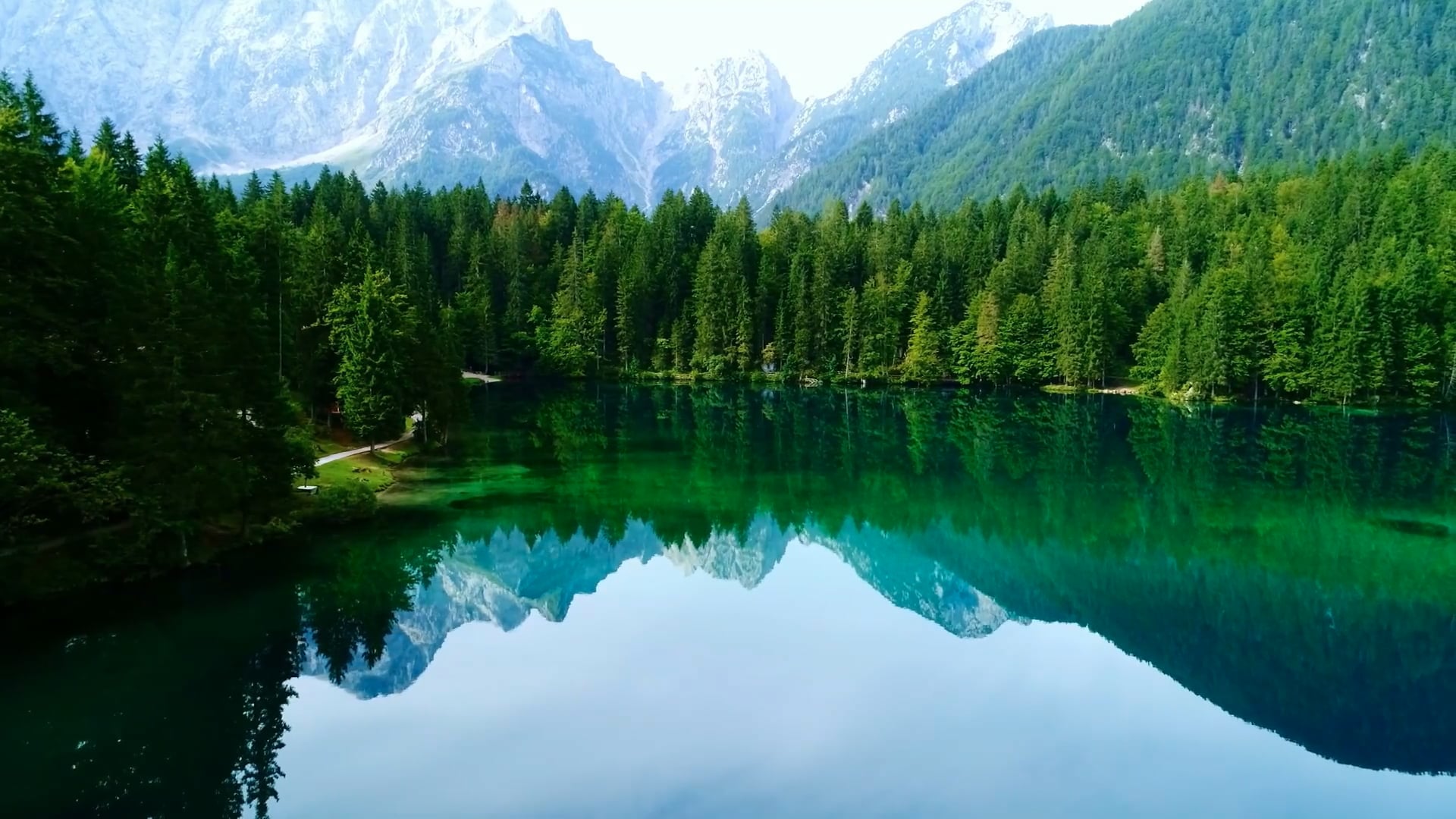 The Fusine Lakes: Drone explores the stunning Italian Alpine scenery ...