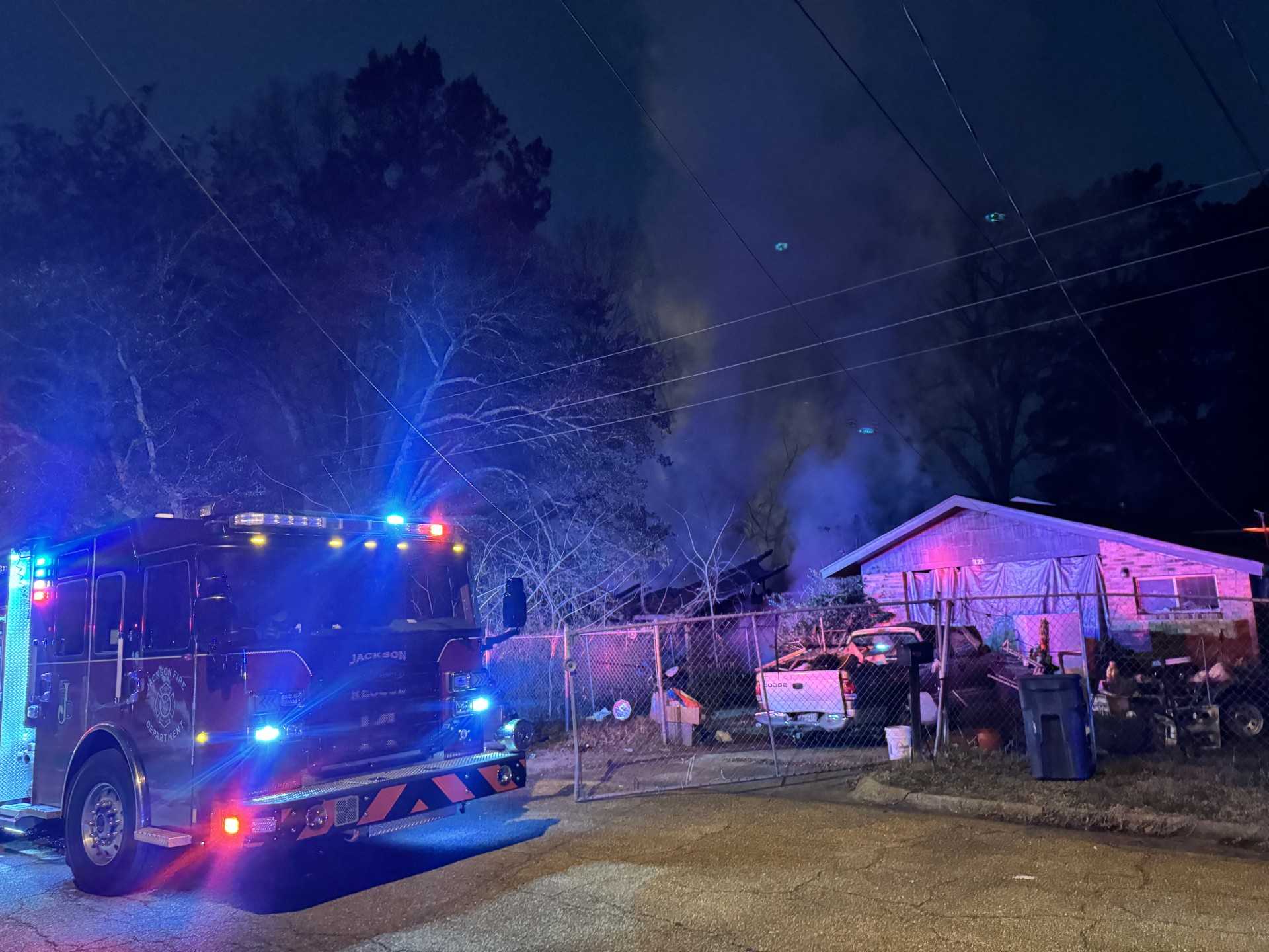 Firefighters battle house fire on McLean Street in the bitter cold