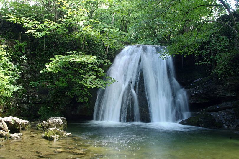 'Magical' fairy waterfall with glowing green pools just 50 miles from ...