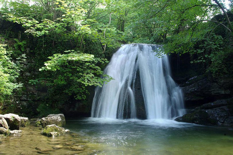 'Magical' fairy waterfall with glowing green pools just 50 miles from ...