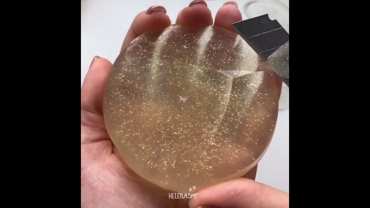 Satisfyingly slicing brown glittery soap
