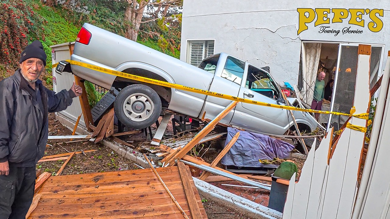 We pulled a GMC pickup out of a house!