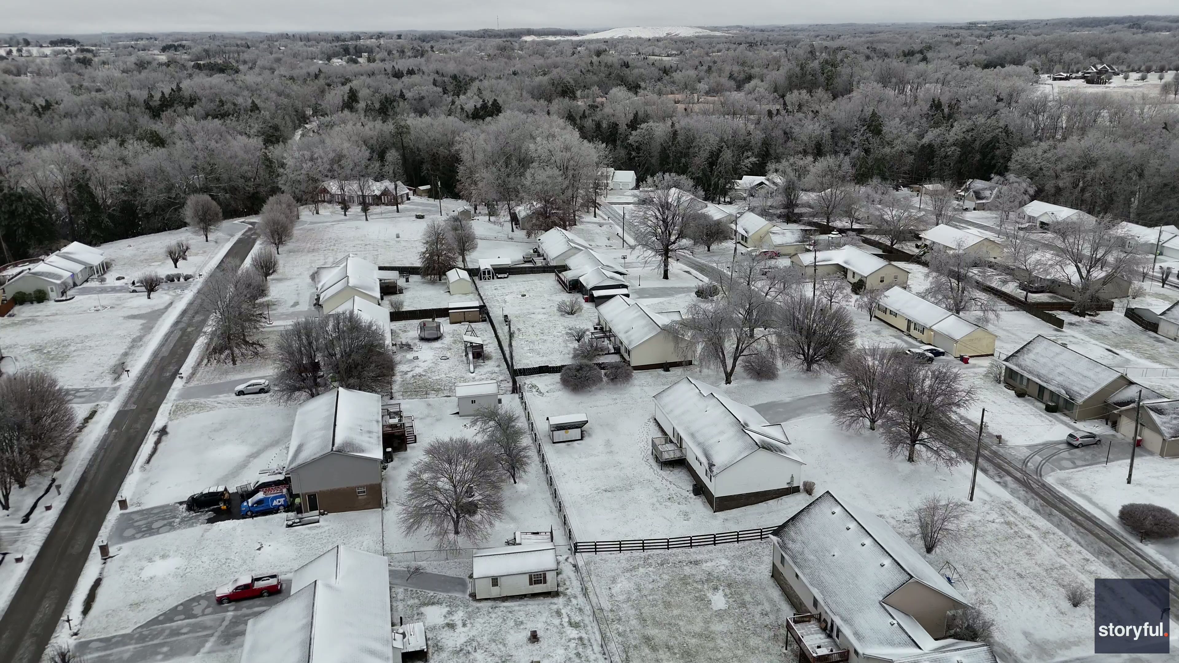 Drone shows snow-covered Kentucky neighborhood amid winter storm