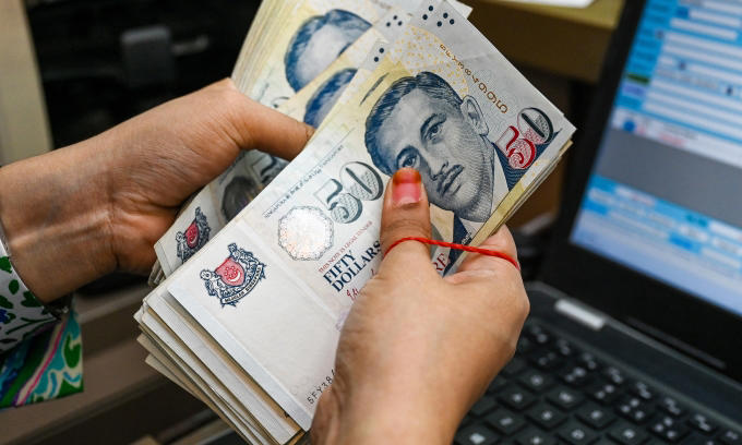 Singapore dollar strengthens to 11-year high against greenback
