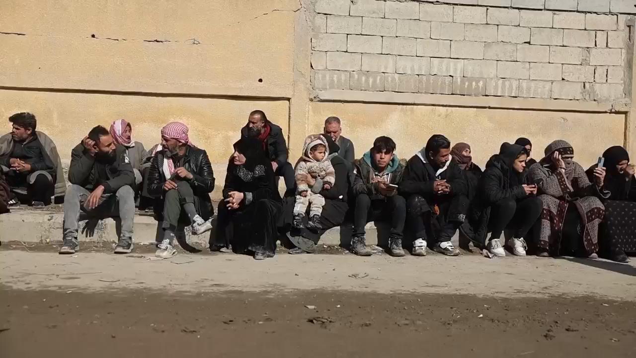 Families of Syrians detained at al-Aqtan prison gather in Raqqa, hoping ...