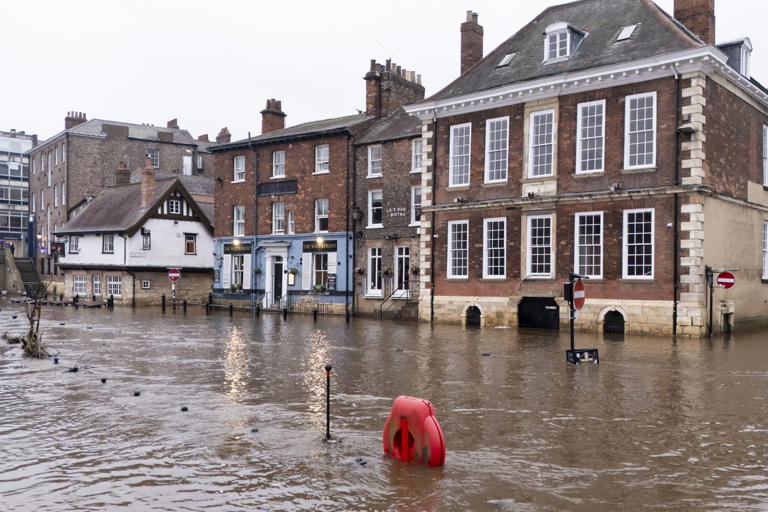 Police search for missing man after empty kayak found during flood