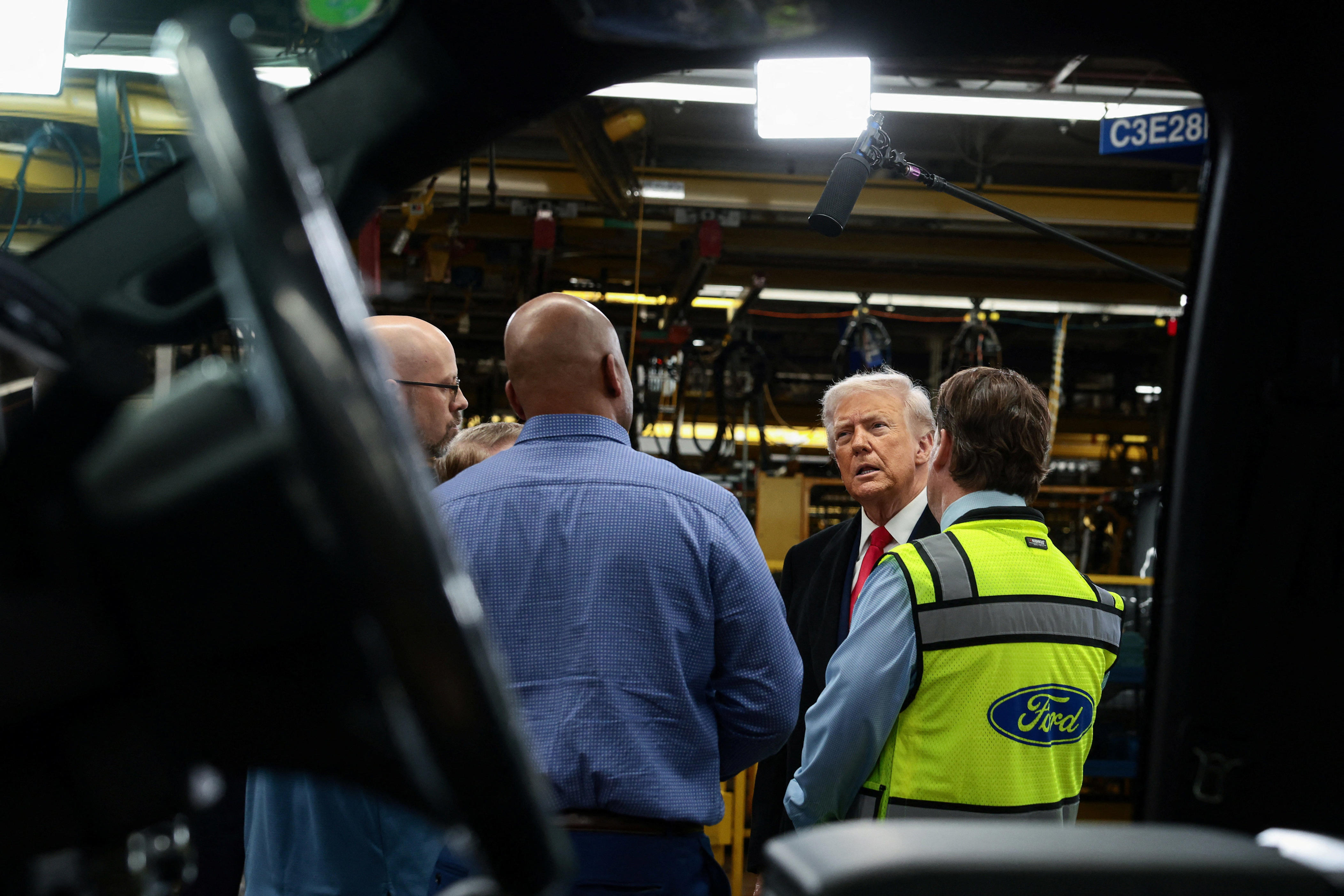 Trump flips off 'lunatic' heckler at Ford plant in Detroit