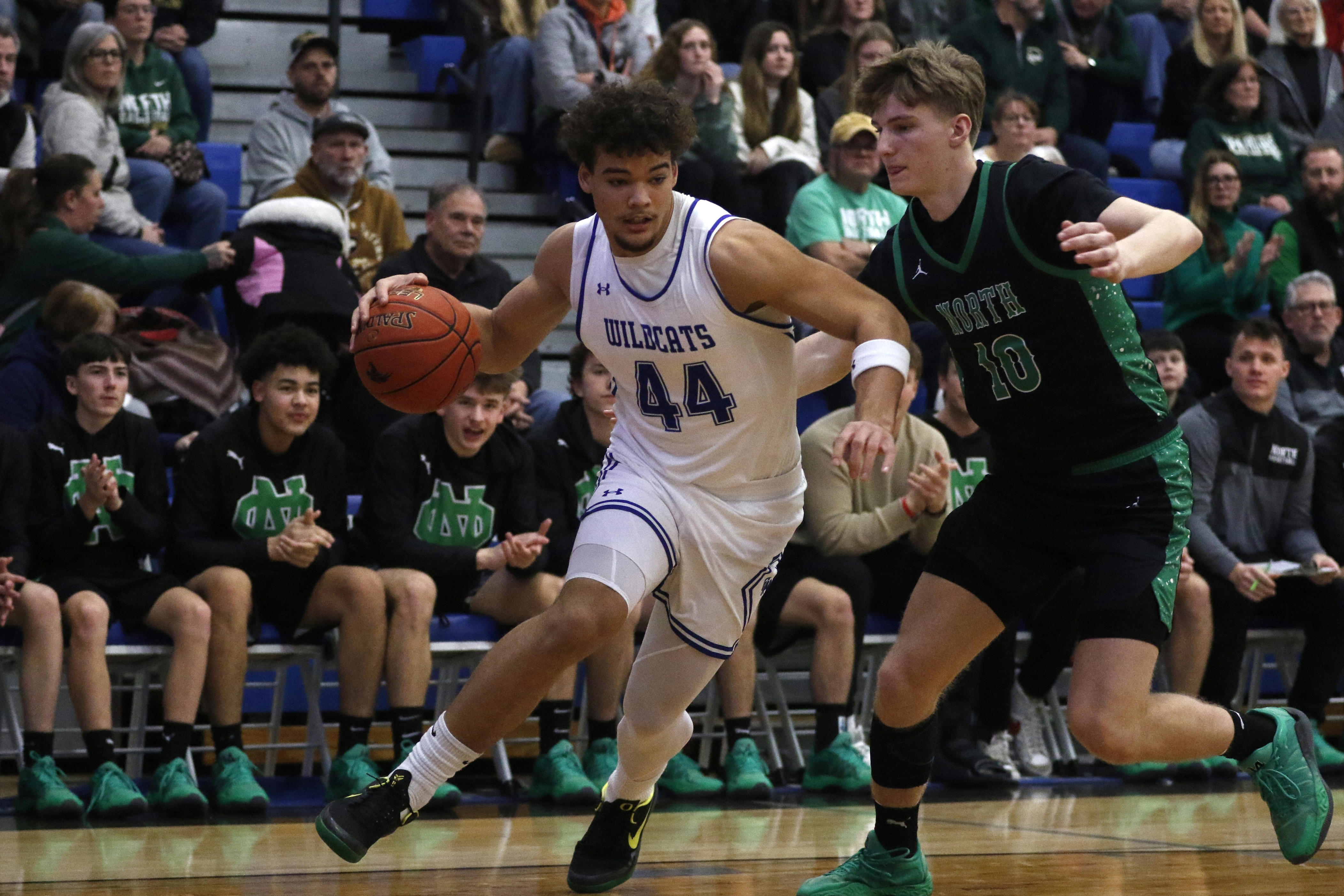 Dominant outings in crosstown rivalry basketball games between Oshkosh ...