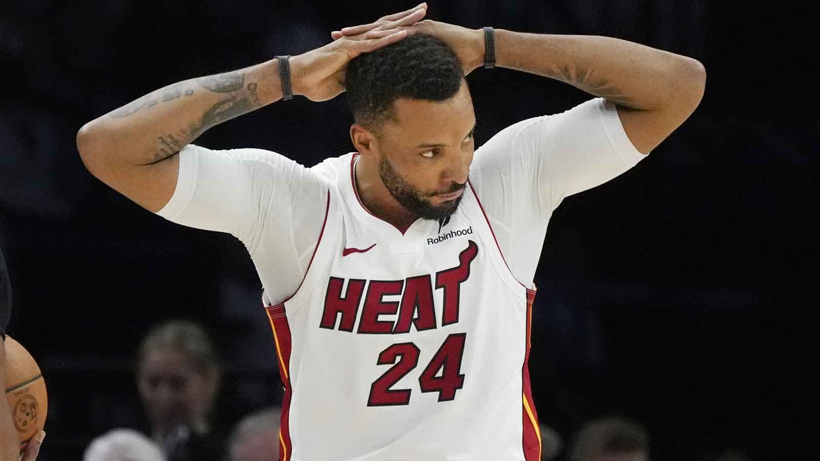 Heat’s Norman Powell had to be held back from charging at Dillon Brooks