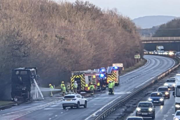 Speed restrictions on A55 after double-decker bus fire in Broughton