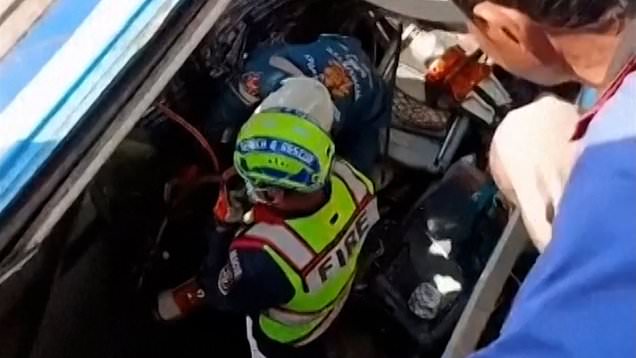 Victims pulled from wreckage after crane collapses onto train in Thailand