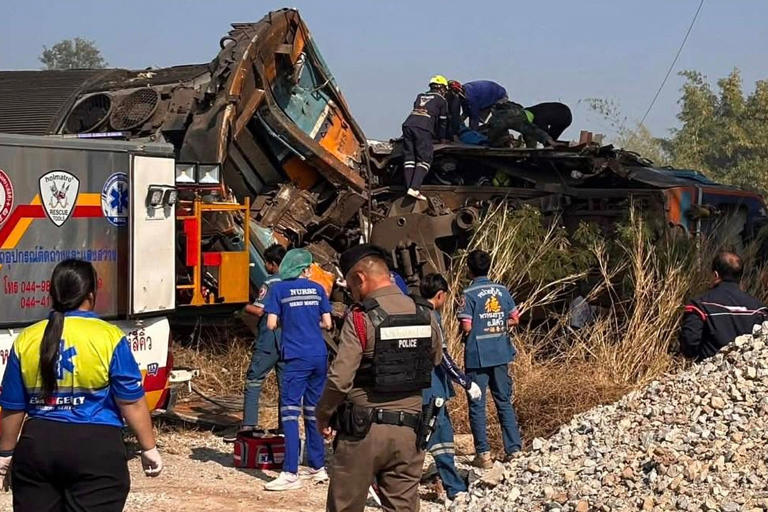 Dozens injured as construction crane collapses on passenger train in ...