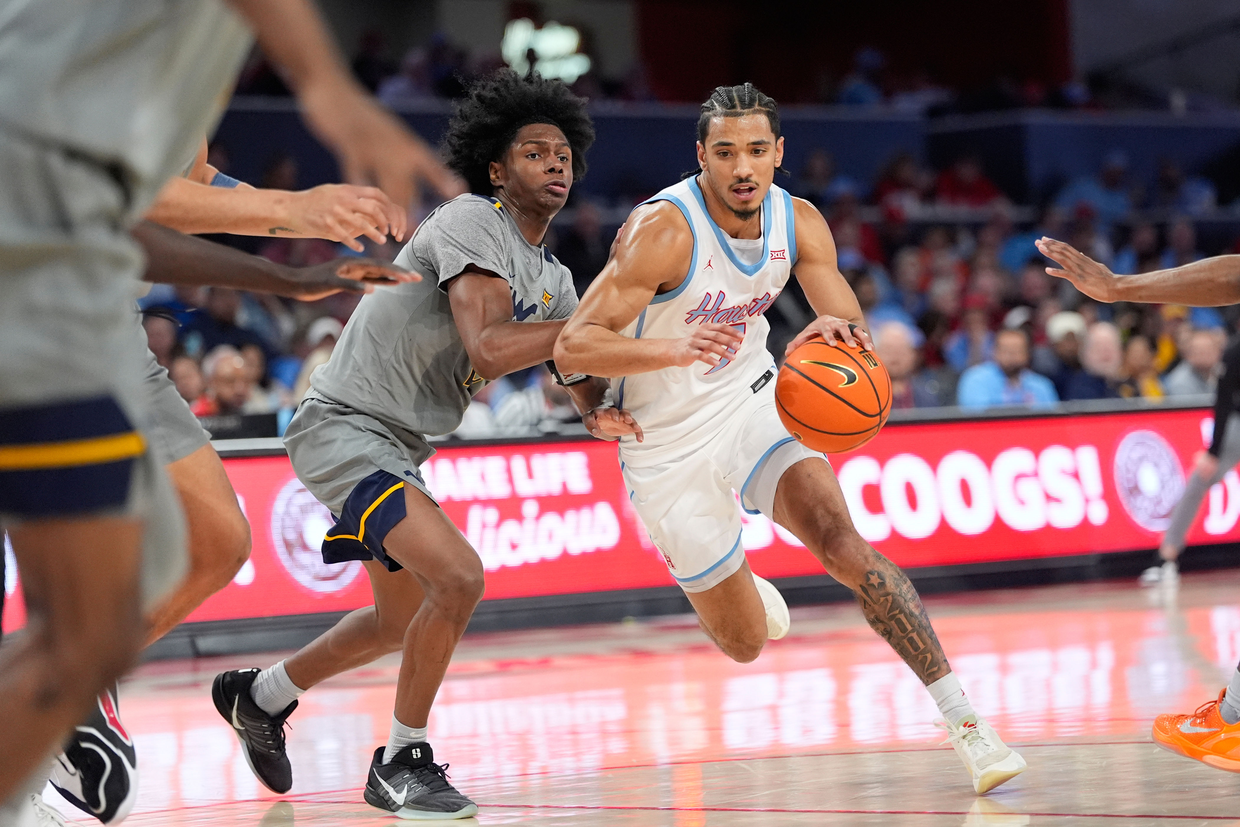 Milos Uzan's 17 points leads No. 7 Houston in 77-48 win over West Virginia