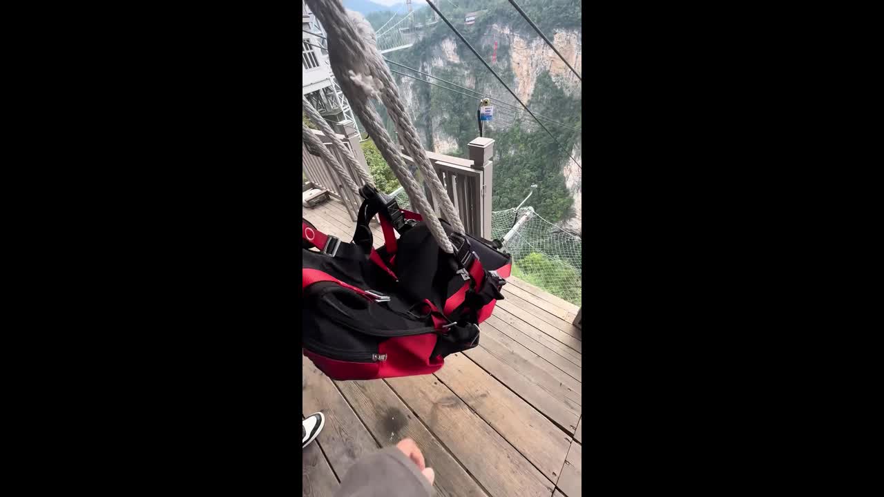 Terrifying 1,000ft high zipline carries tourists across gorge in China