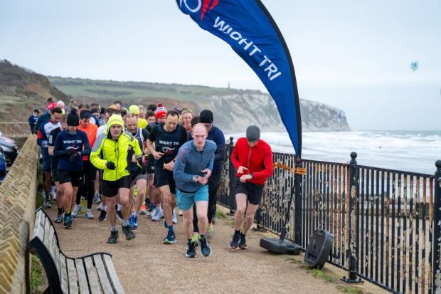 Island runners complete 10k race in strong winds and blowing sand