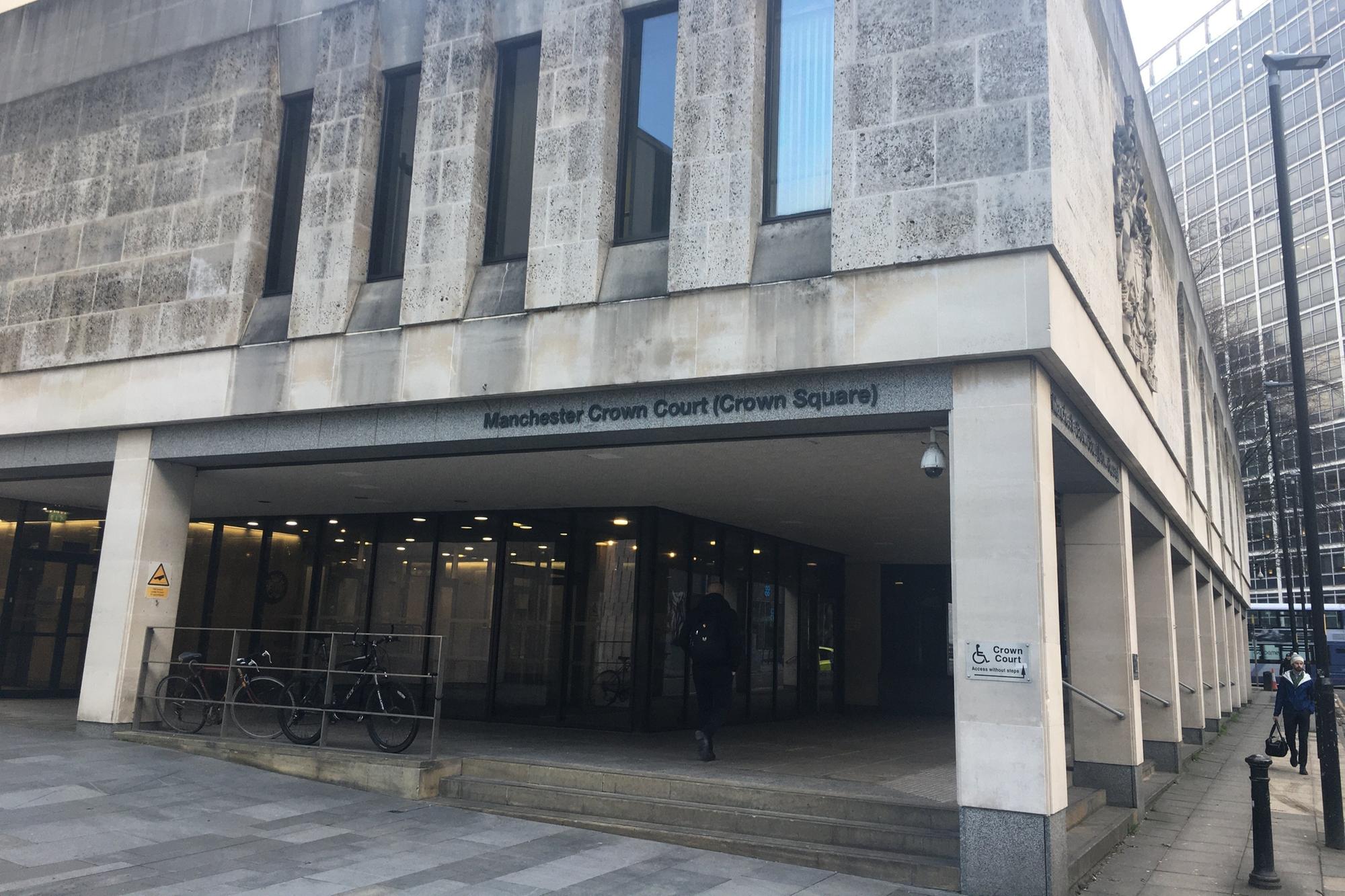 A Wigan woman has appeared in court charged with murdering her baby son