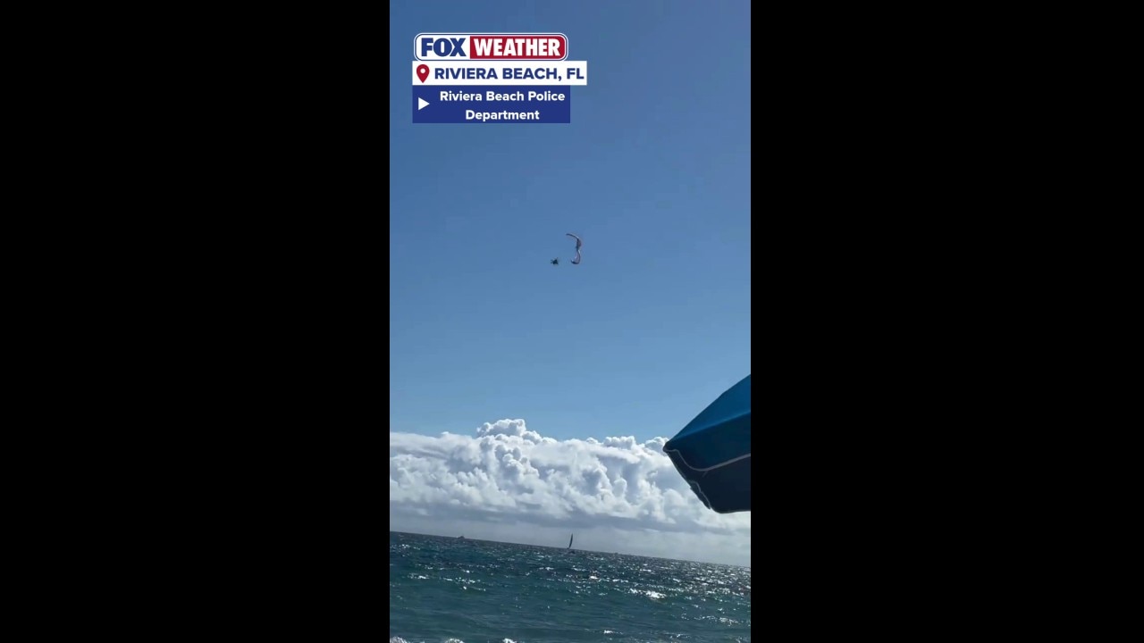 Paraglider splashes into the Atlantic Ocean after falling from the sky ...