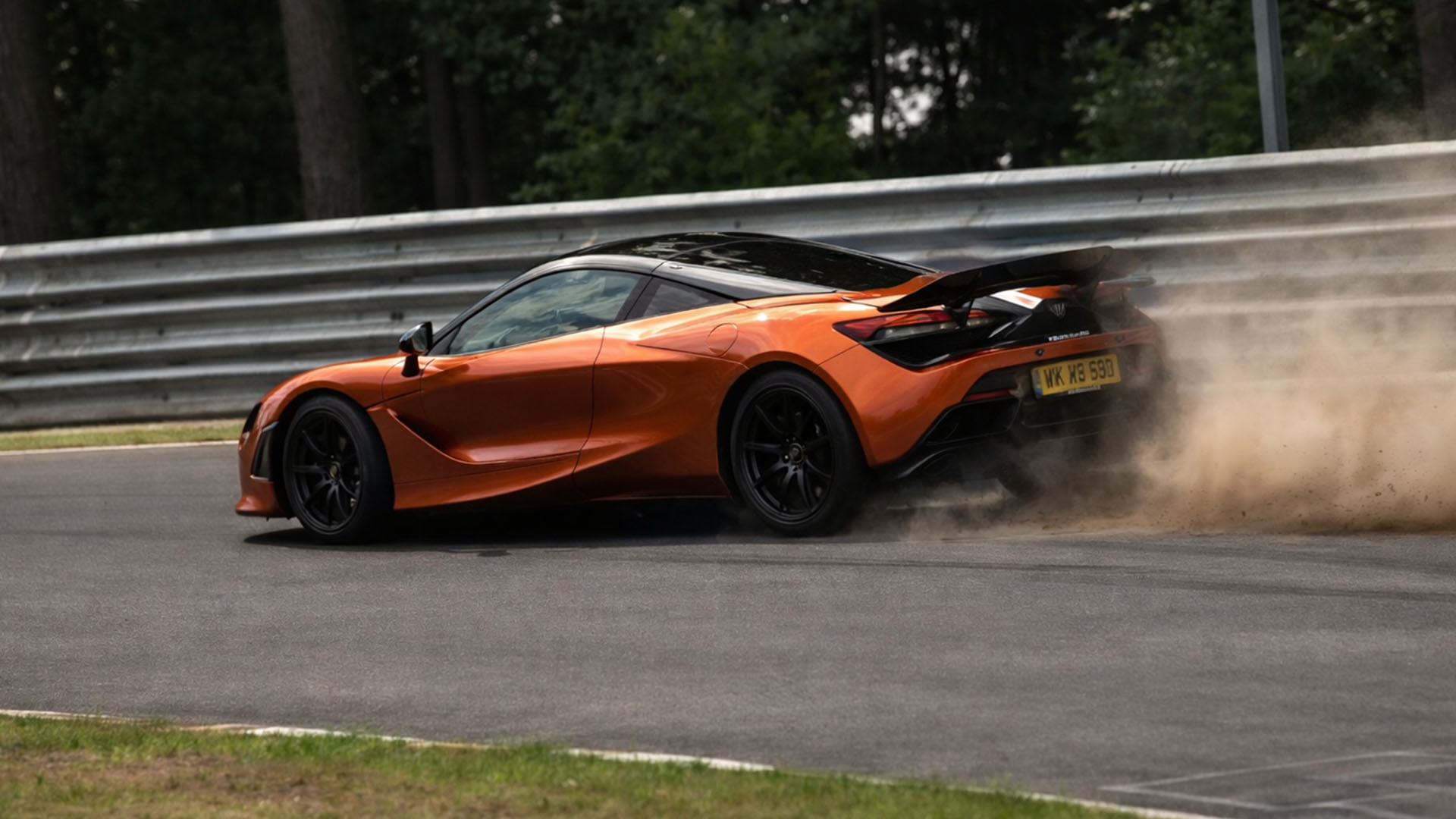 Wild drift sends dust flying at Nordschleife