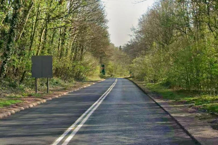 Driver arrested as crash shuts busy road