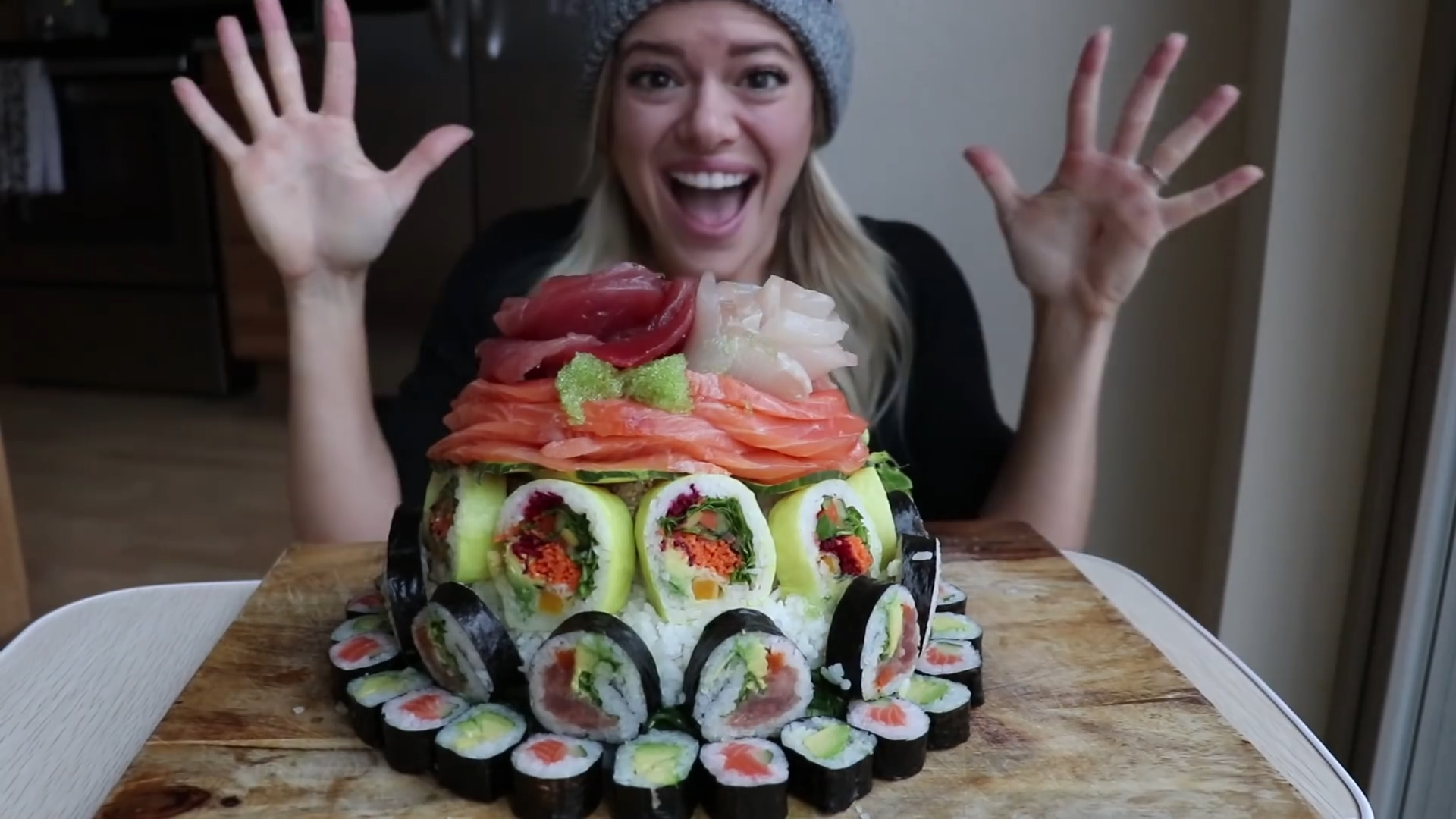 Blondie eats a full sushi cake mukbang