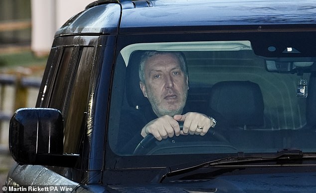 Michael Carrick car-shares with assistant Jonathan Woodgate as he ...