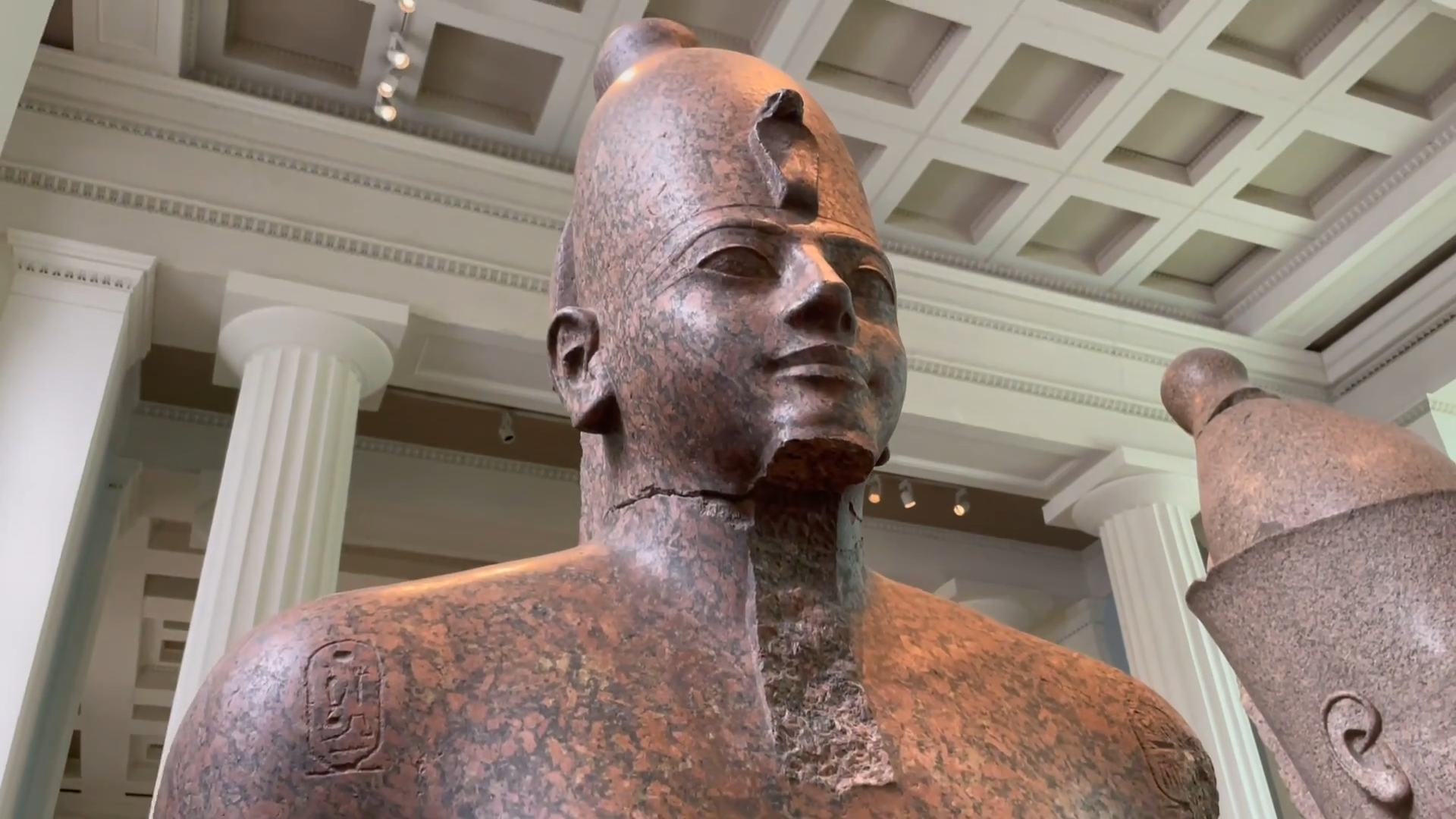 Why is this statue here - and what’s carved on its back?