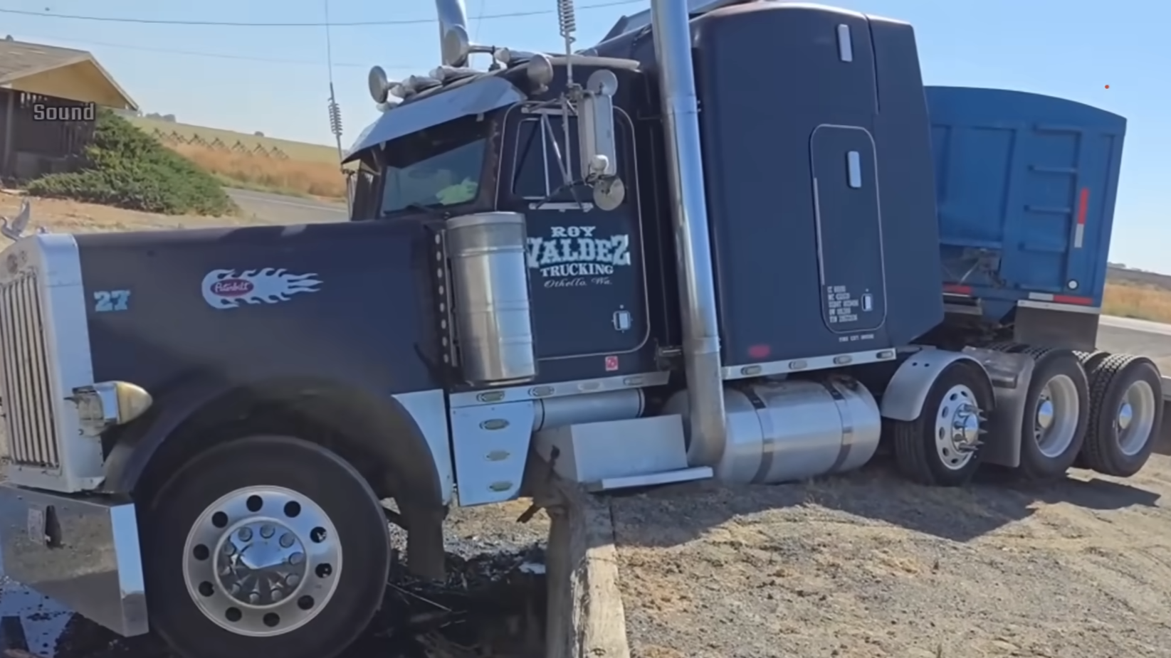 The dump truck didn’t stop until it hit the yard