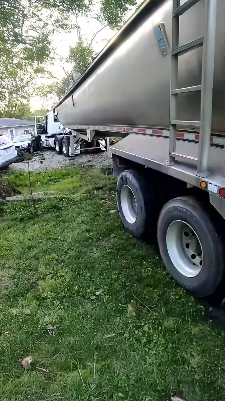Truck leaves the road near a home