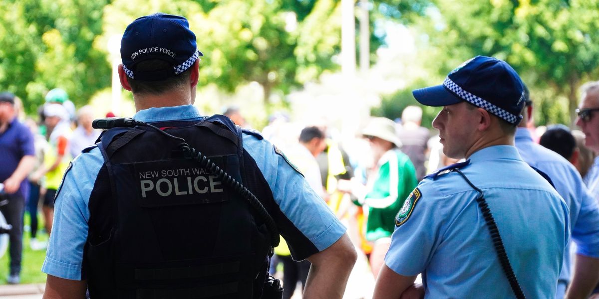 Armed police and banned flags reshape Australian Open
