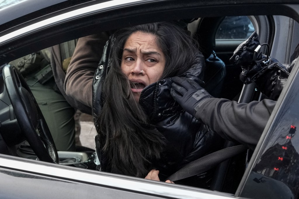 Woman seen on video allegedly blocking Minnesota ICE operation with car ...