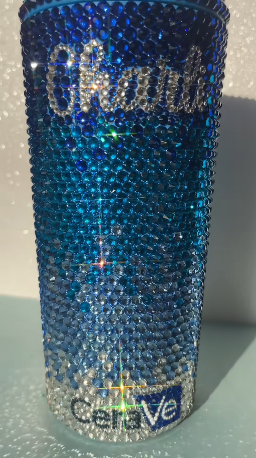 Bedazzling a blue rhinestone tumbler