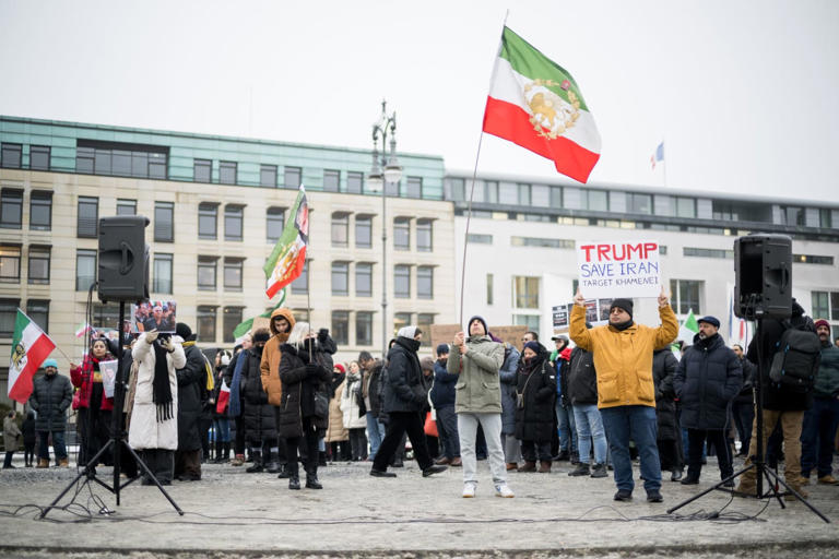 Protesters tear down Iranian flag at Berlin embassy