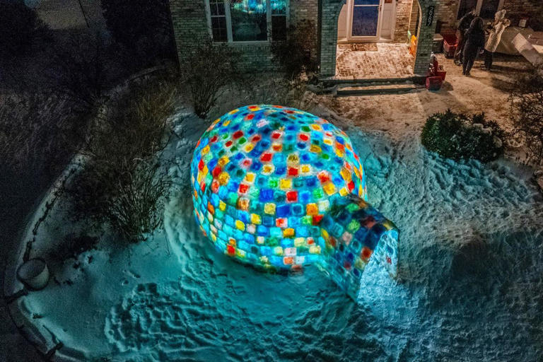 Family builds 12-foot rainbow igloo using 700 ice blocks. Then a warm ...