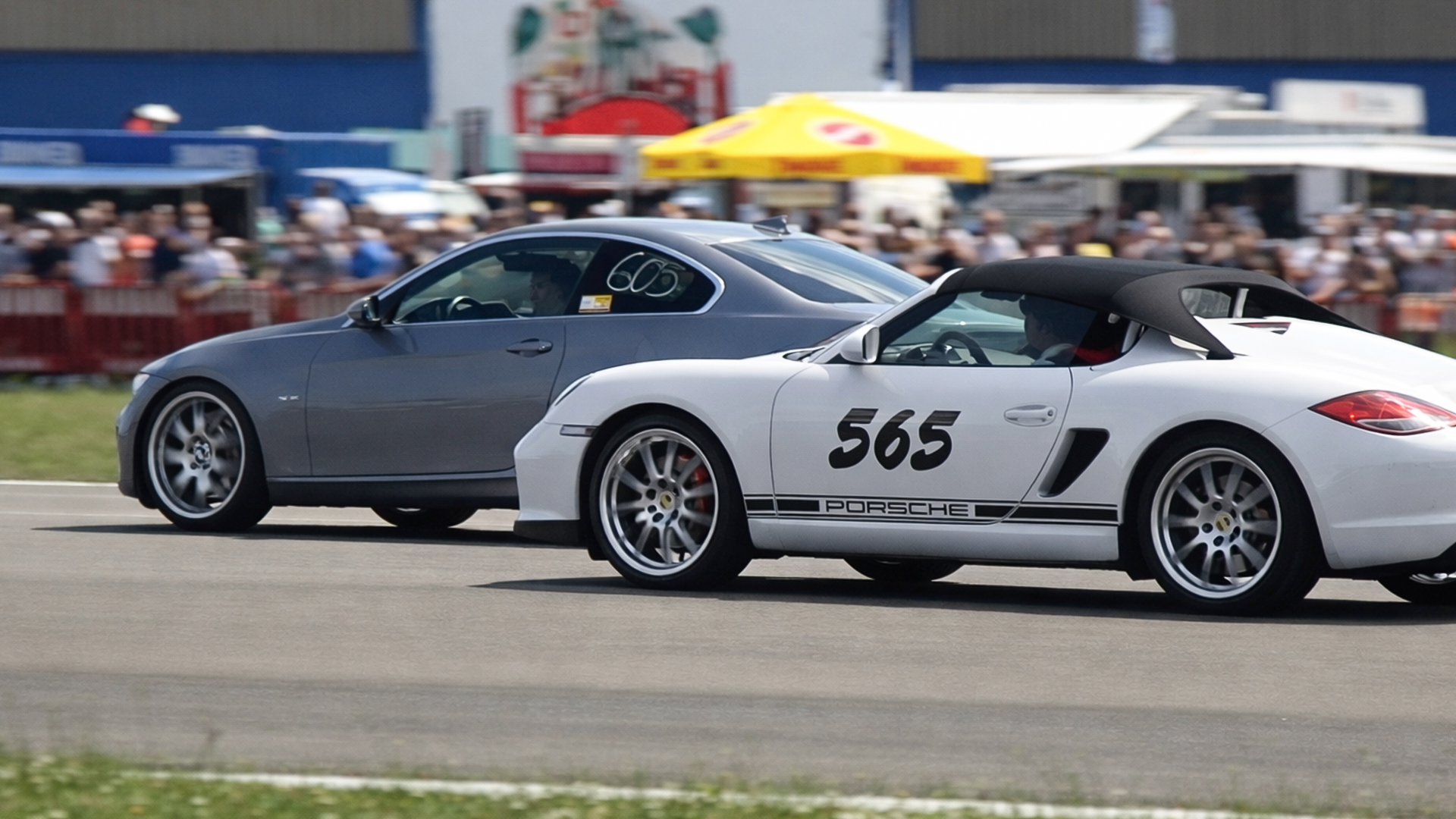BMW 335i and Porsche Boxster S in quarter mile battle