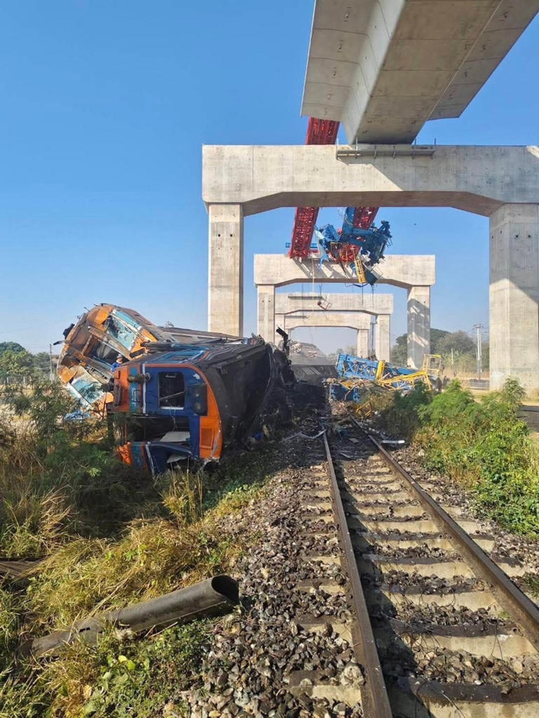 Construction crane collapses on passenger train in Thailand, killing at ...