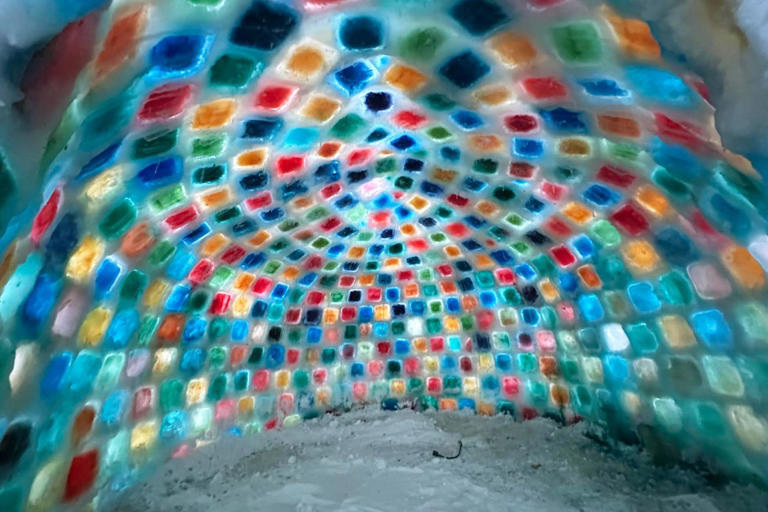 Family builds 12-foot rainbow igloo using 700 ice blocks. Then a warm ...