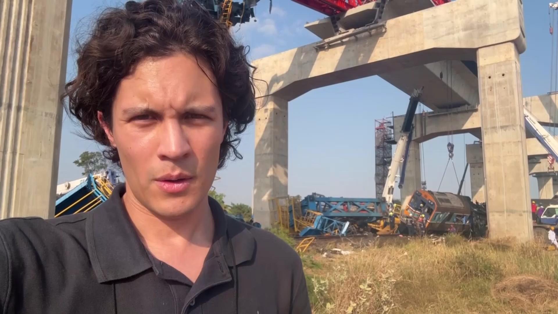 Construction crane falls onto moving train in Thailand, killing dozens