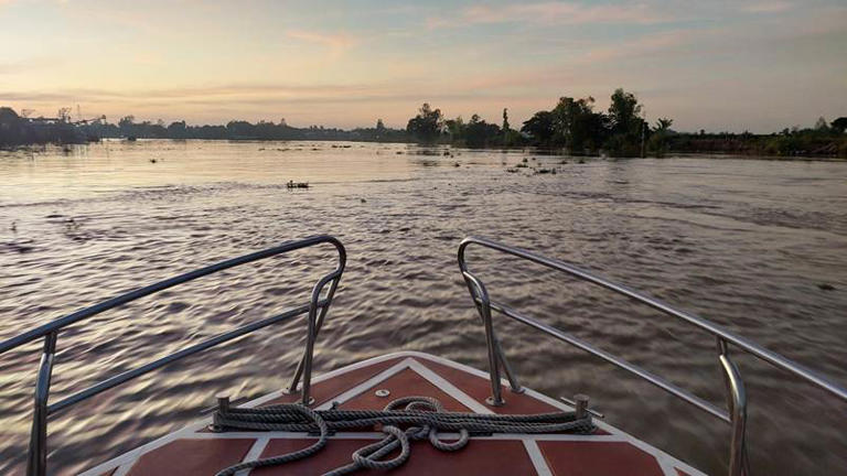Crossing from Cambodia to Vietnam by boat down the Mekong: A cinematic ...