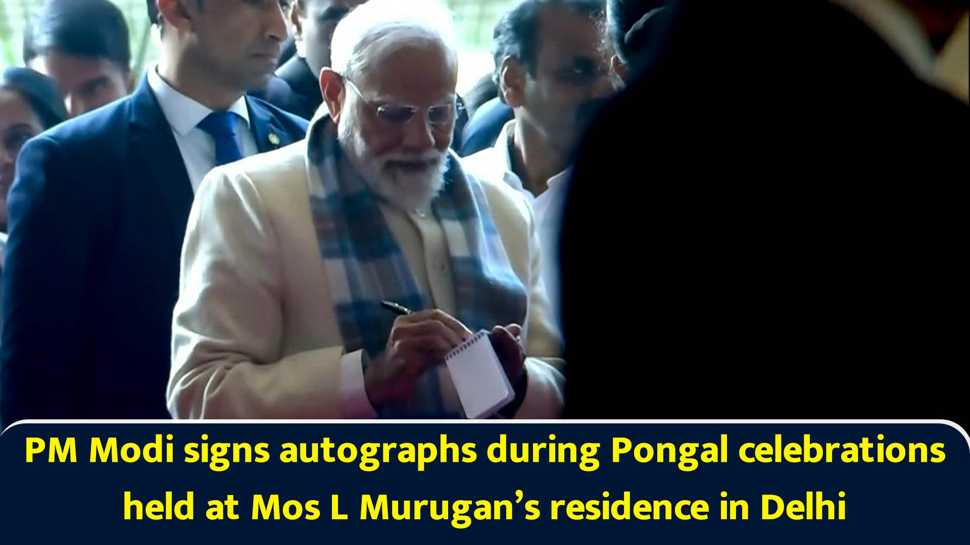 PM Modi signs autographs during Pongal celebrations held at MOS L ...