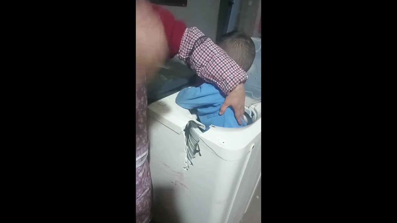 Mother rescues toddler stuck inside washing machine