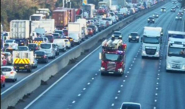 M3 traffic live: Vehicle fire sparks chaos for drivers facing 90-minute ...