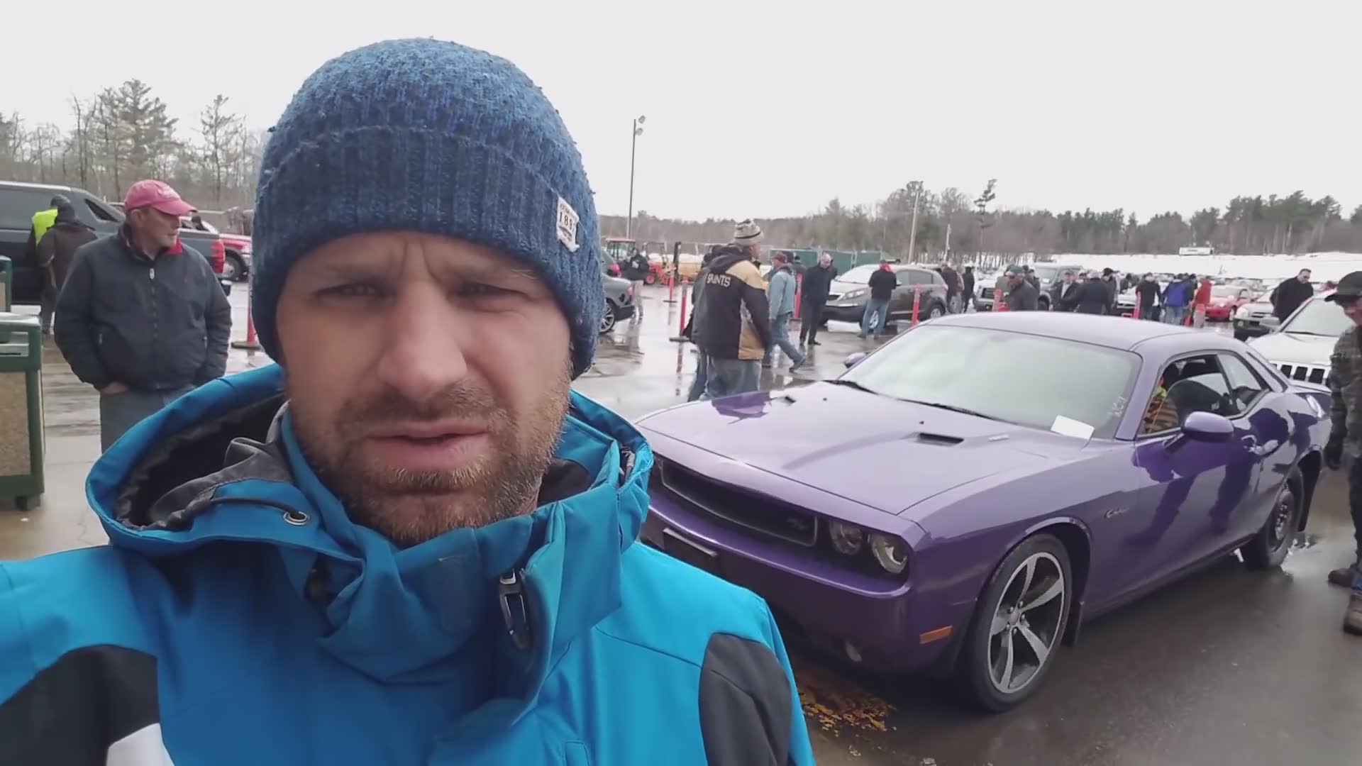 Evaluating distinctive purple Mopar at dealer auction