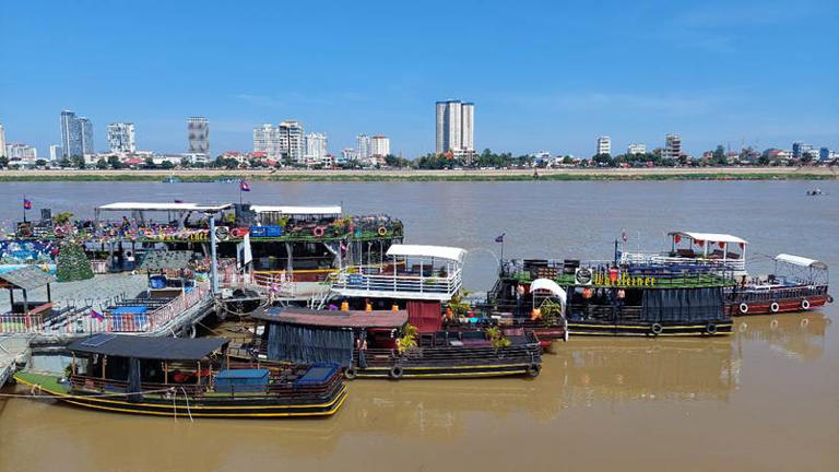Crossing from Cambodia to Vietnam by boat down the Mekong: A cinematic ...