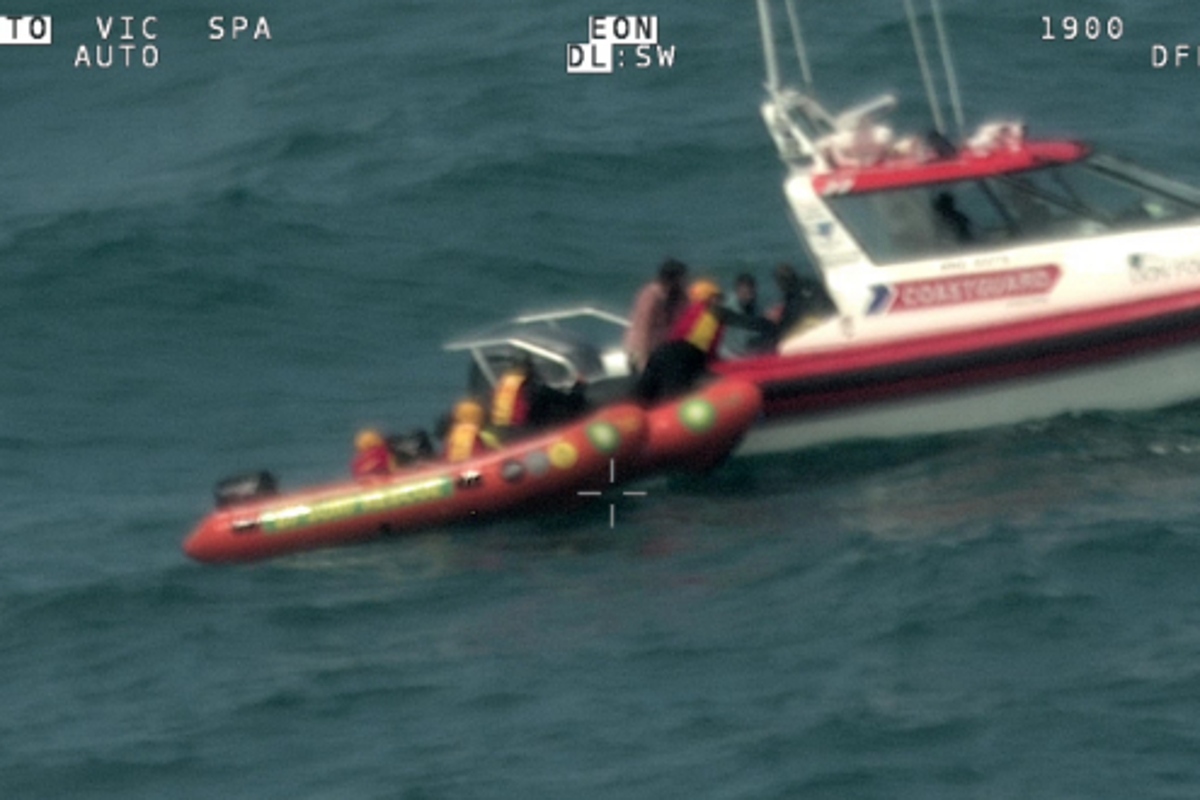 Three rescued from sea after six hours clinging to a single lifejacket